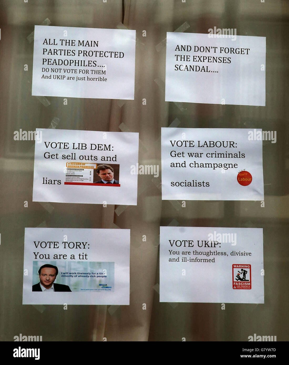 EDS NOTE RUDE WORDS ON POSTER A homeowner in Wavertree, Liverpool shows ...