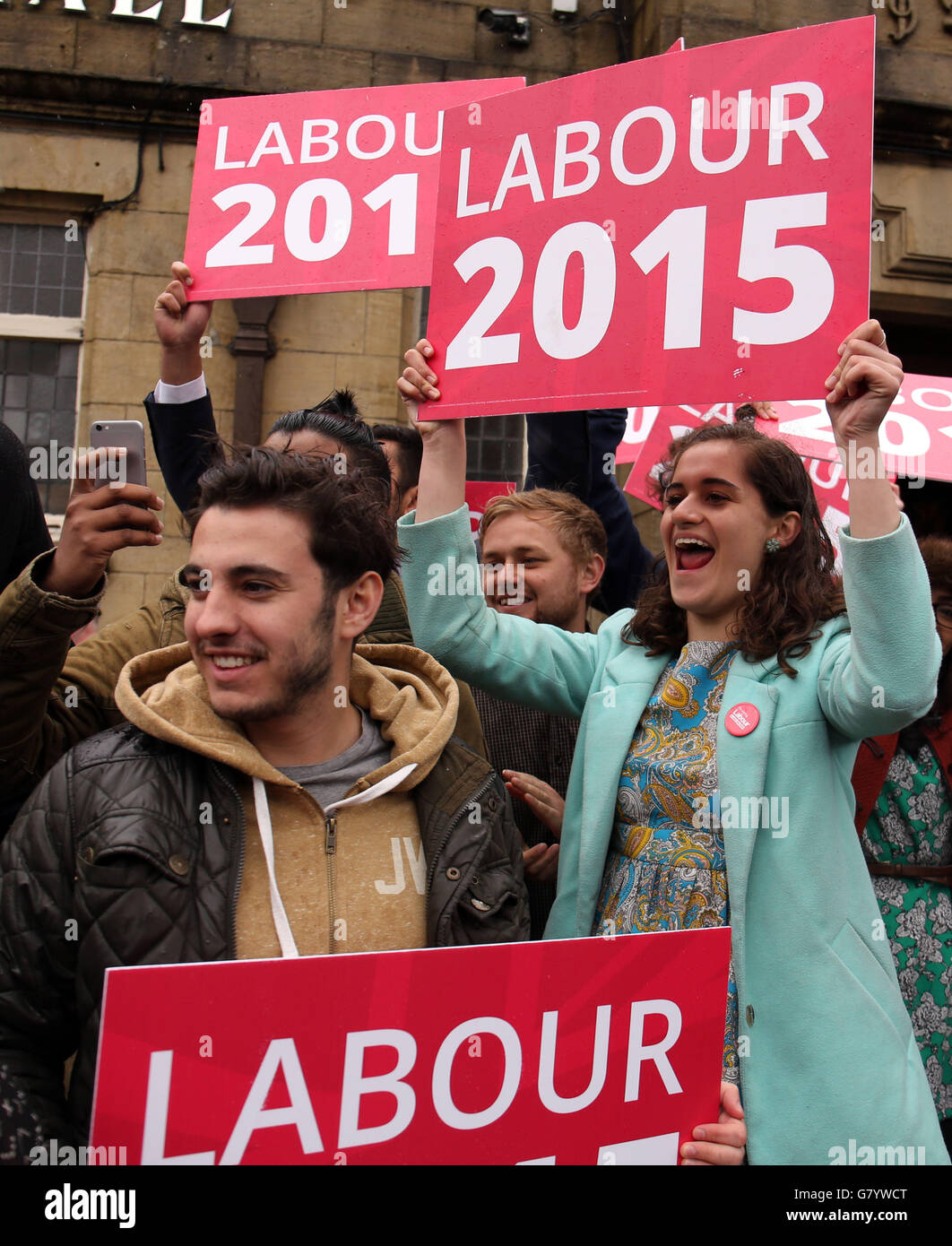 Labour Party supporters cheer as leader Ed Miliband arrives for a ...