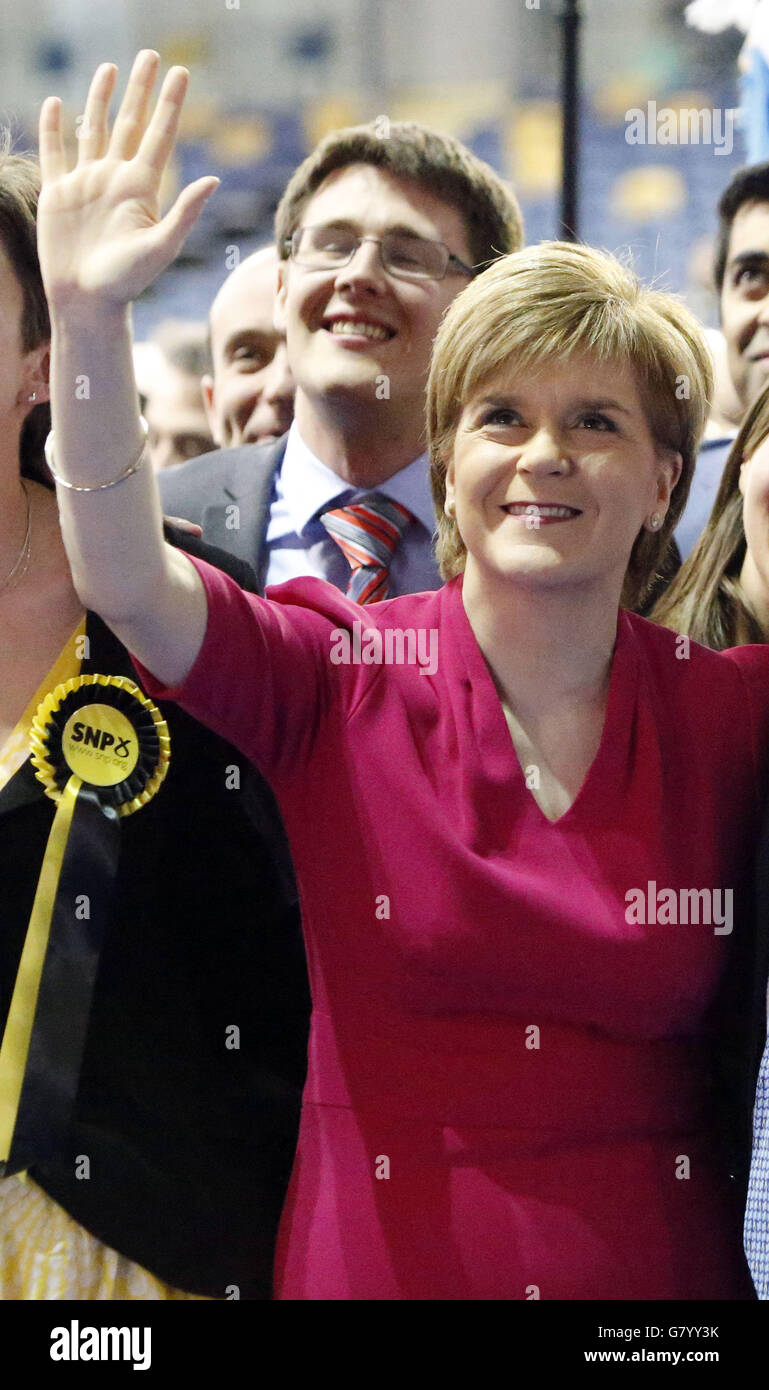 SNP leader Nicola Sturgeon stands with supporters as she arrives at the ...