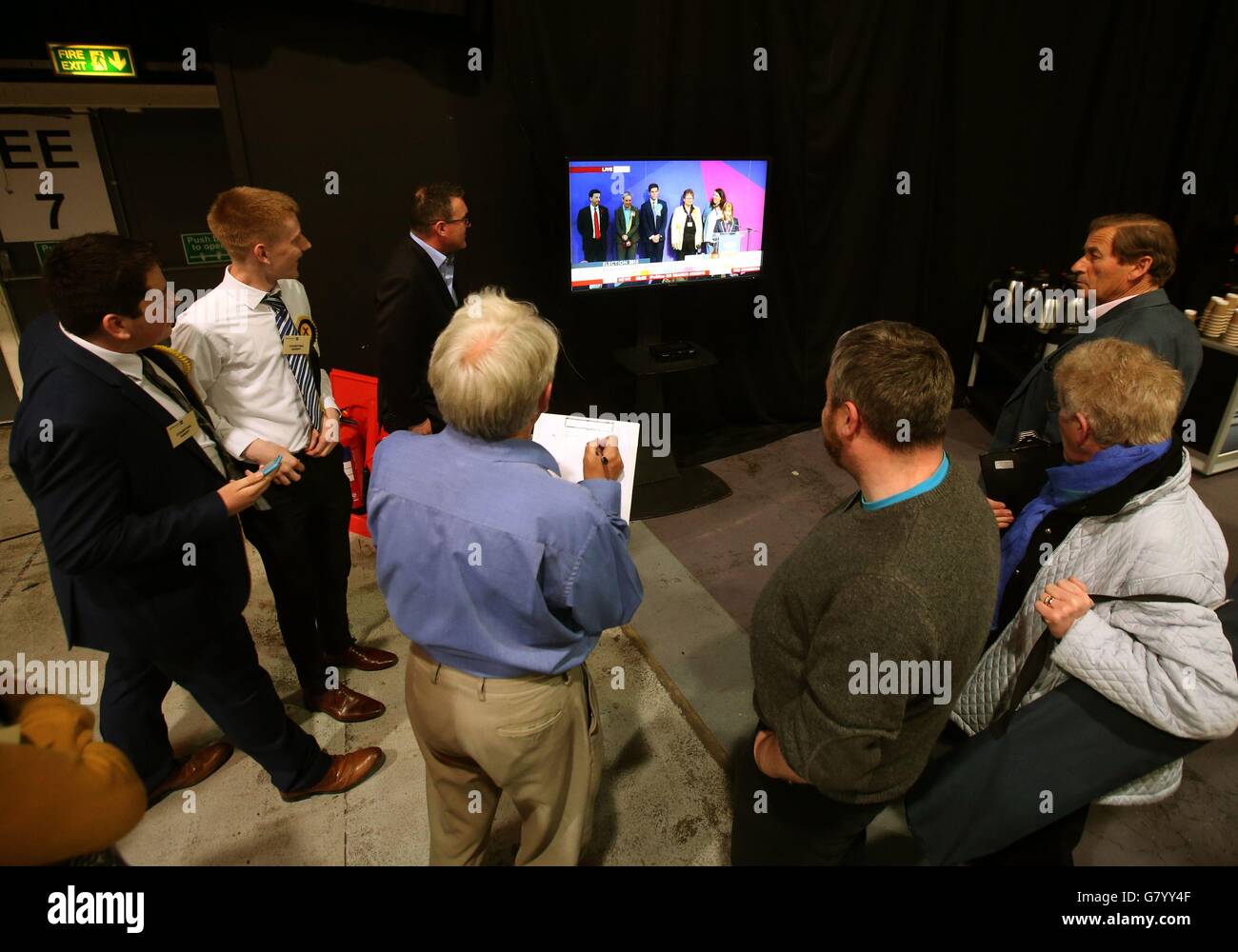 People watch declarations for the General Election on television at the ...