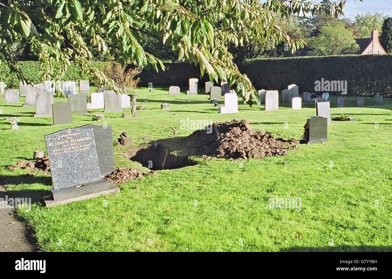 Desecrated grave of Gladys Hammond, whose body was taken from her grave ...
