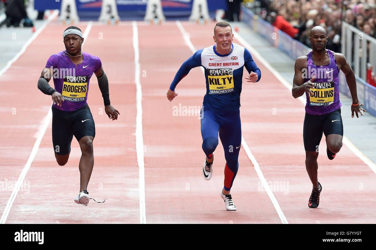 Michael Rogers (left) wins the Men's 100m ahead of Richard Kilty ...
