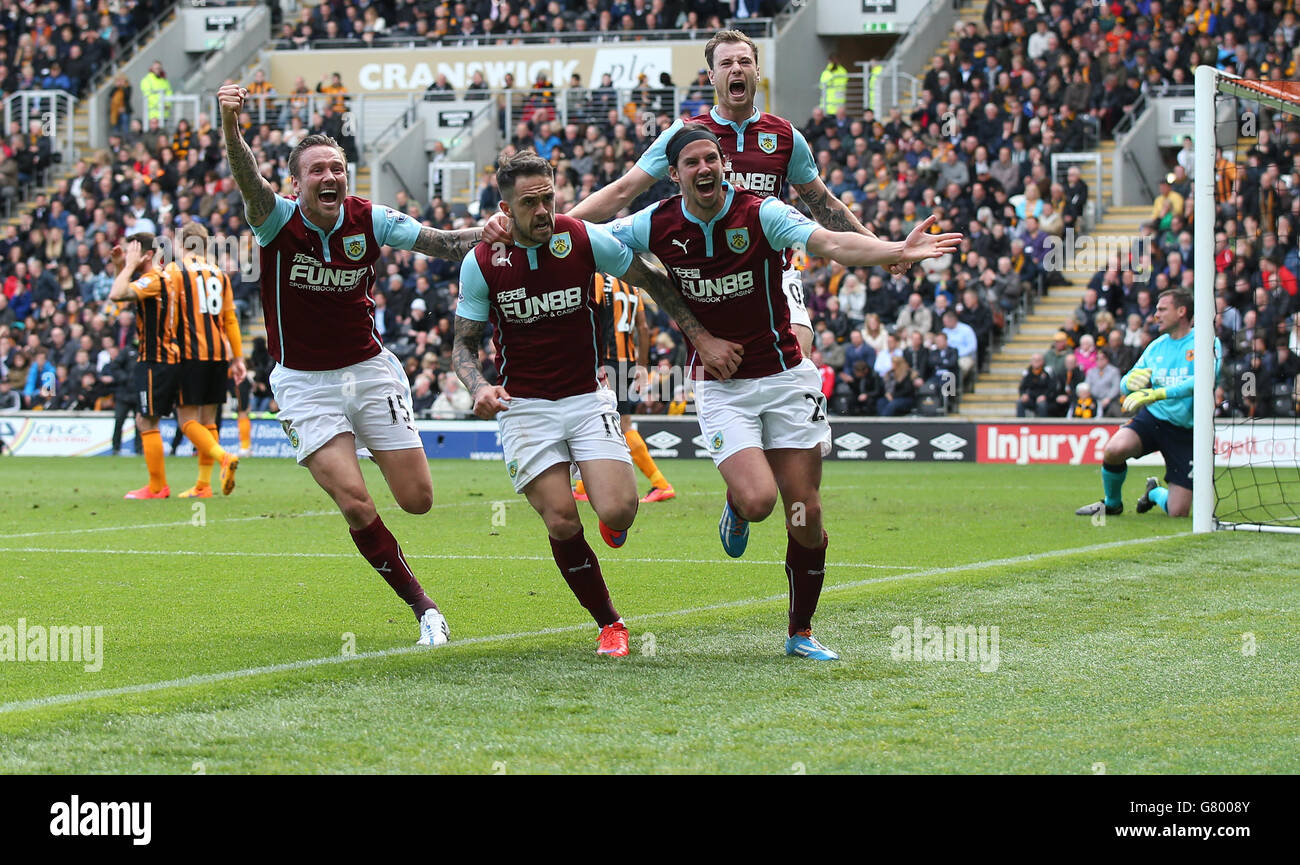 Burnley's Danny Ings (centre) celebrates with Matthew Taylor and George ...