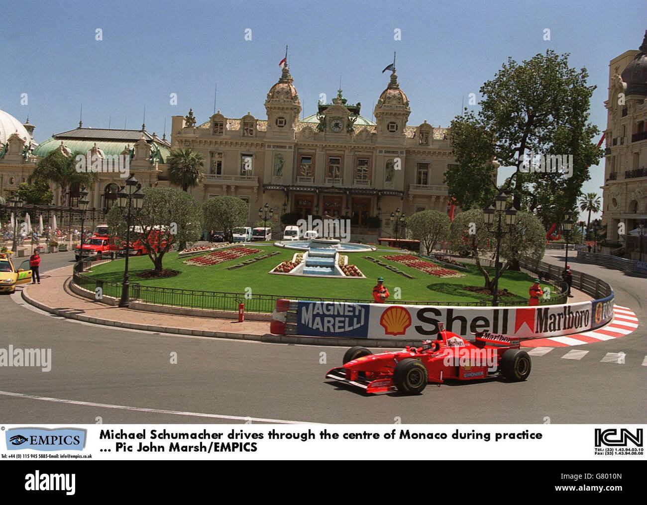Michael schumacher drives through the centre of monaco during practice ...