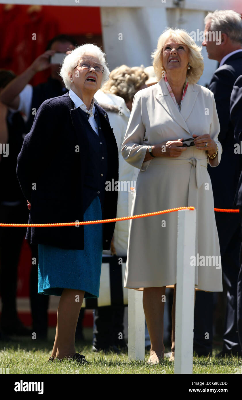 Queen Elizabeth II is joined by the Duchess of Cornwall to watch one of ...