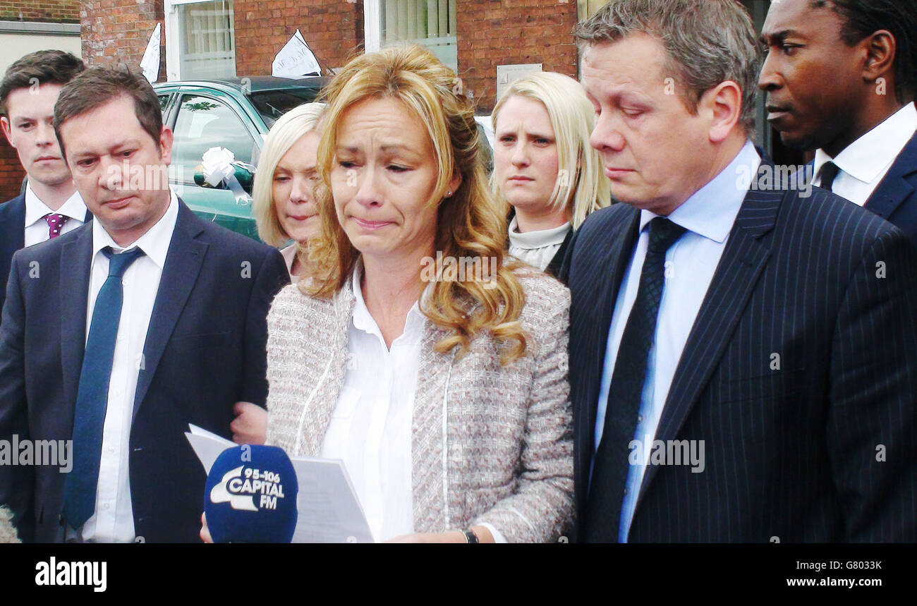 Sharon Wood makes a statement with Paul Wood (right, husband) and Neil ...