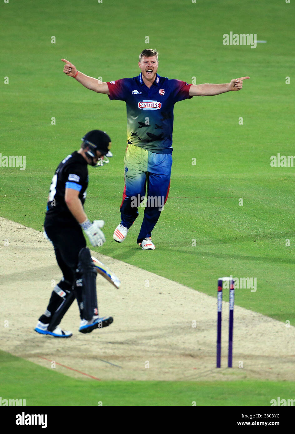 Sussex's Chris Nash loses his wicket to Kent's Mitchell Claydon (top ...
