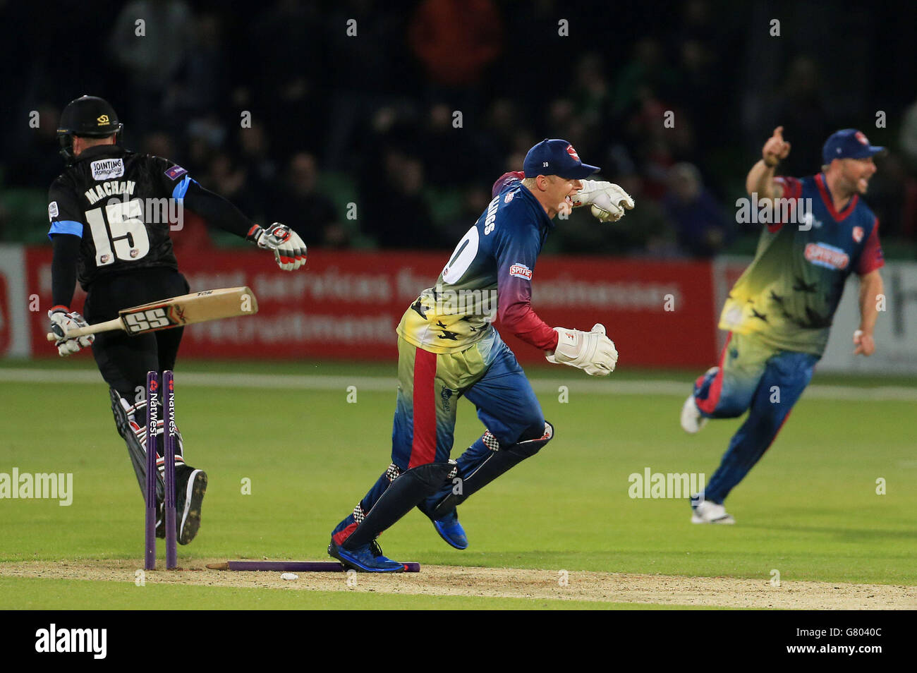 Sussex's Matt Machan (left) is run out by Kent's Sam Billings (middle ...