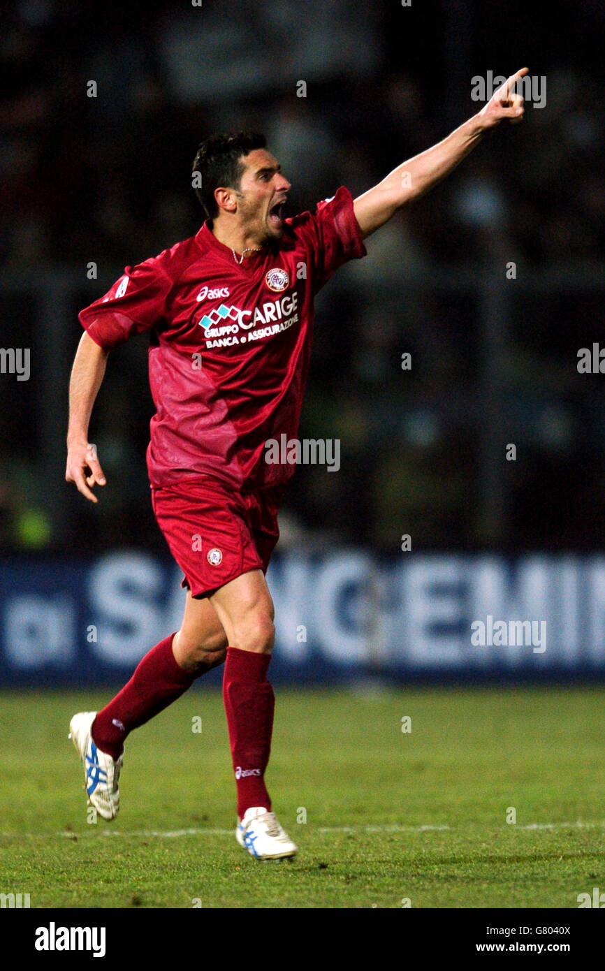 Livorno's Alessandro Lucarelli celebrates scoring their first goal ...
