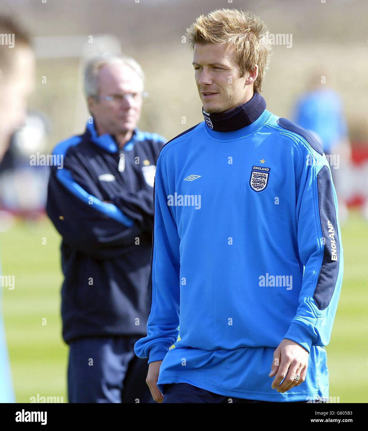 England's David Beckham is watched by manager Sven-Goran Eriksson ...