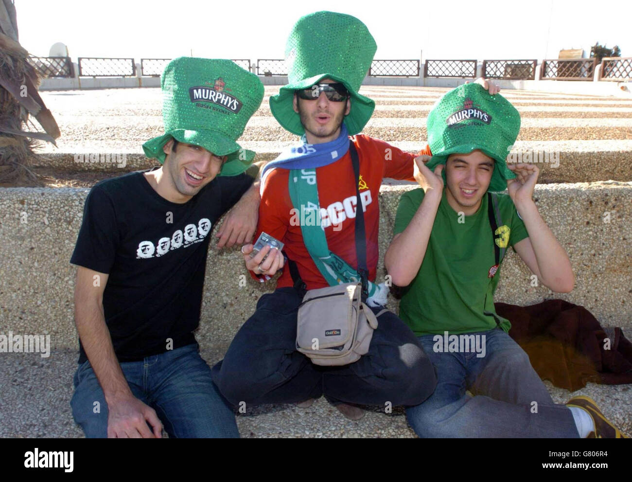 Israeli soccer fans wearing Irish novelty hats on the seafront in Tel ...