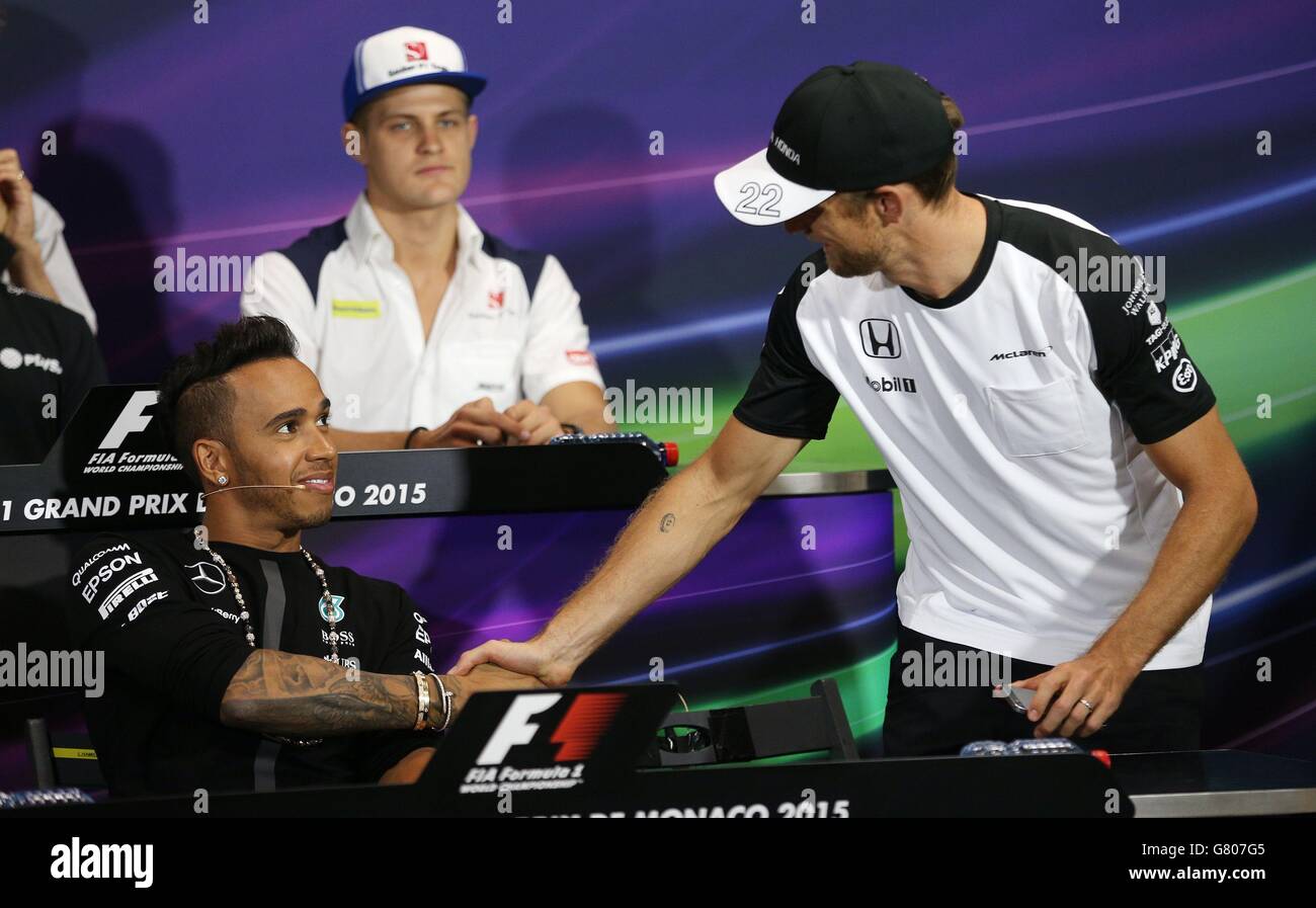 Mercedes Lewis Hamilton and McLaren's Jenson Button shake hands during ...