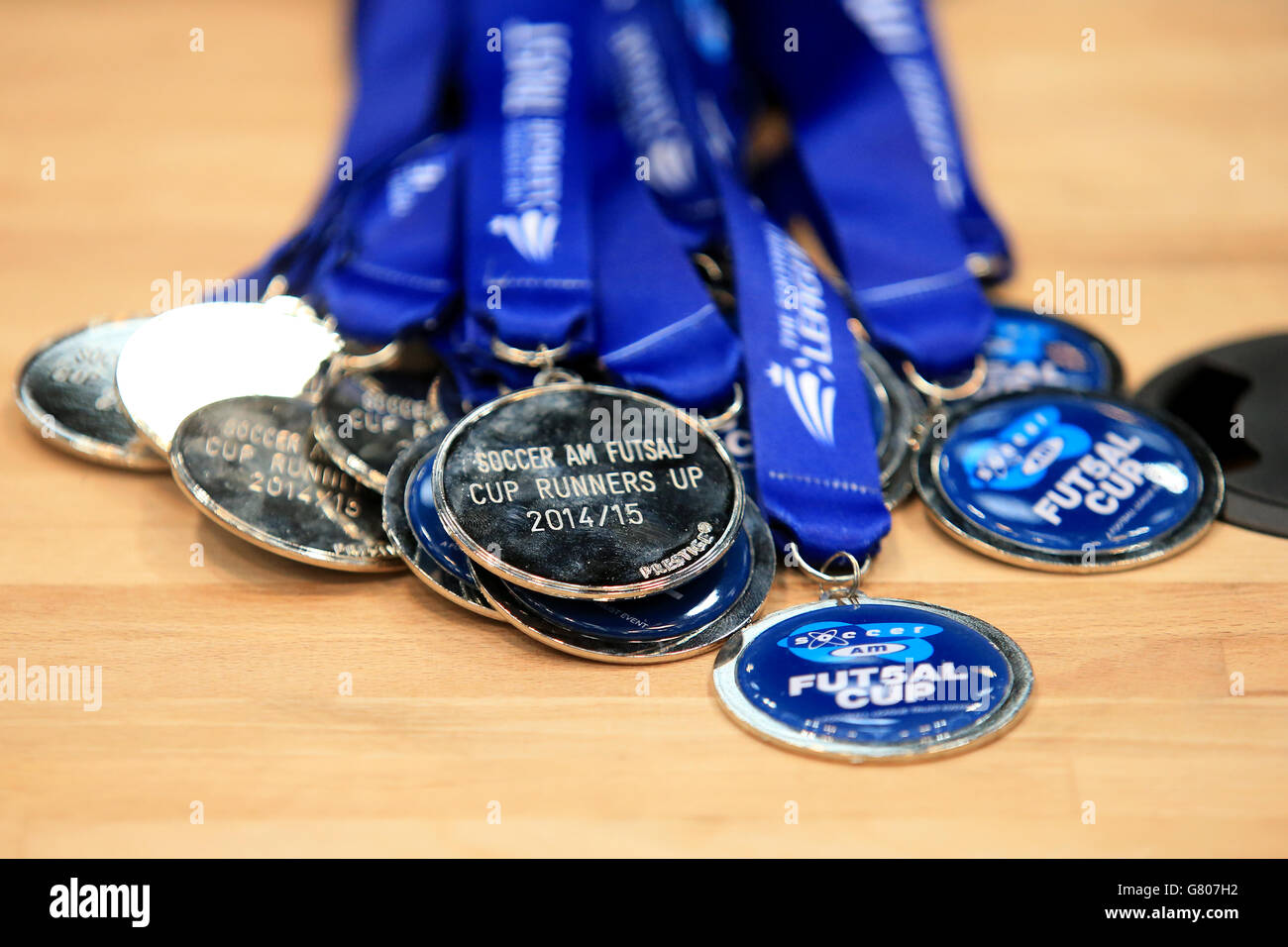 Detail of the soccer am futsal cup runners up medals hi-res stock ...