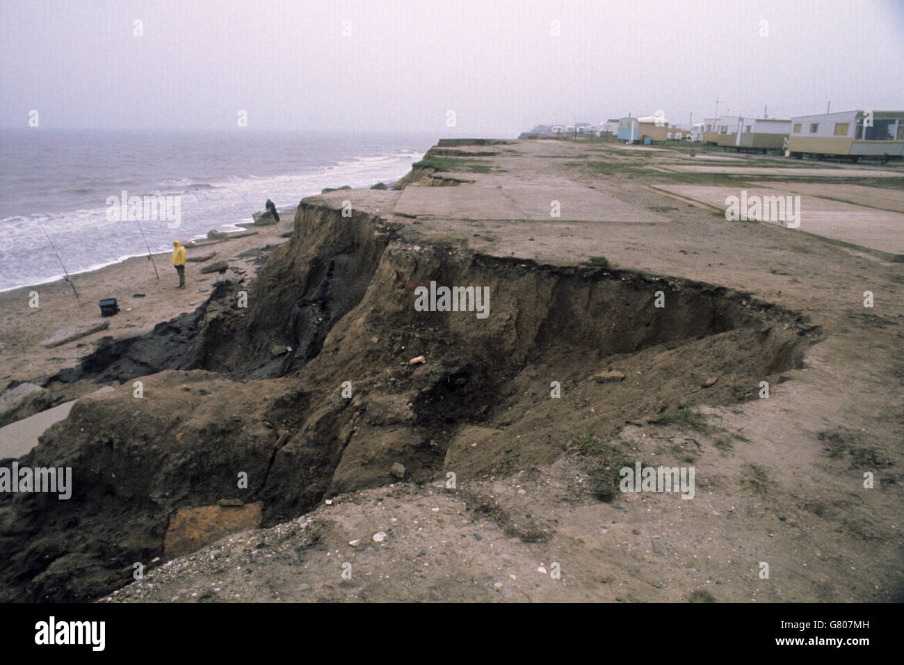 Crumbling cliffs at Skipsea on the East Coast, where rapid erosion is ...
