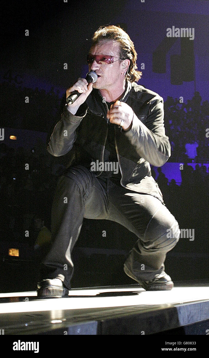 U2 lead singer bono performs on stage hi-res stock photography and ...