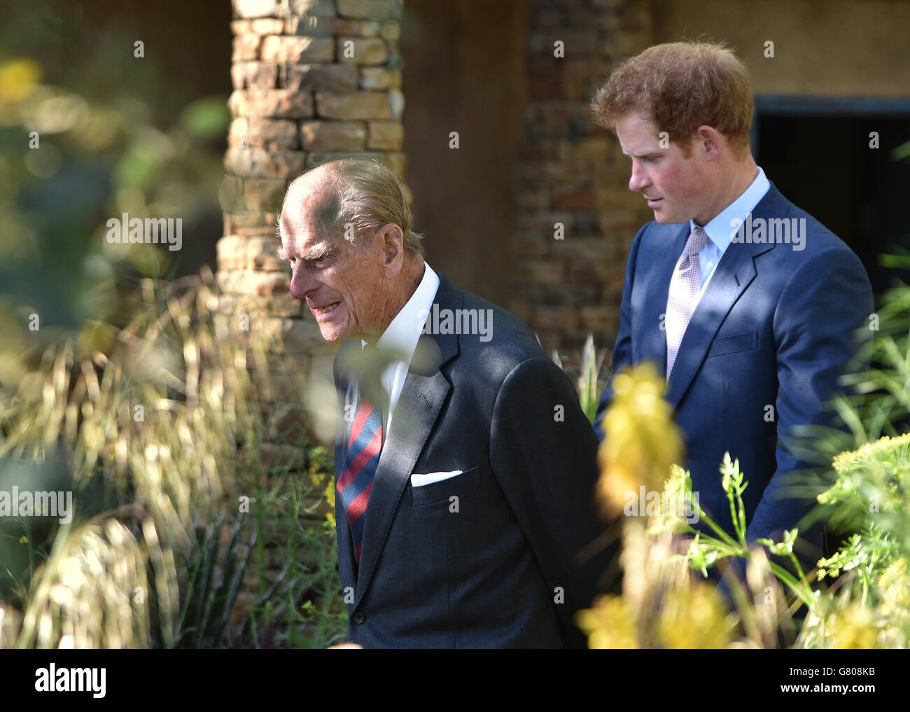 The Duke of Edinburgh and Prince Harry in the Sentebale Garden as they ...