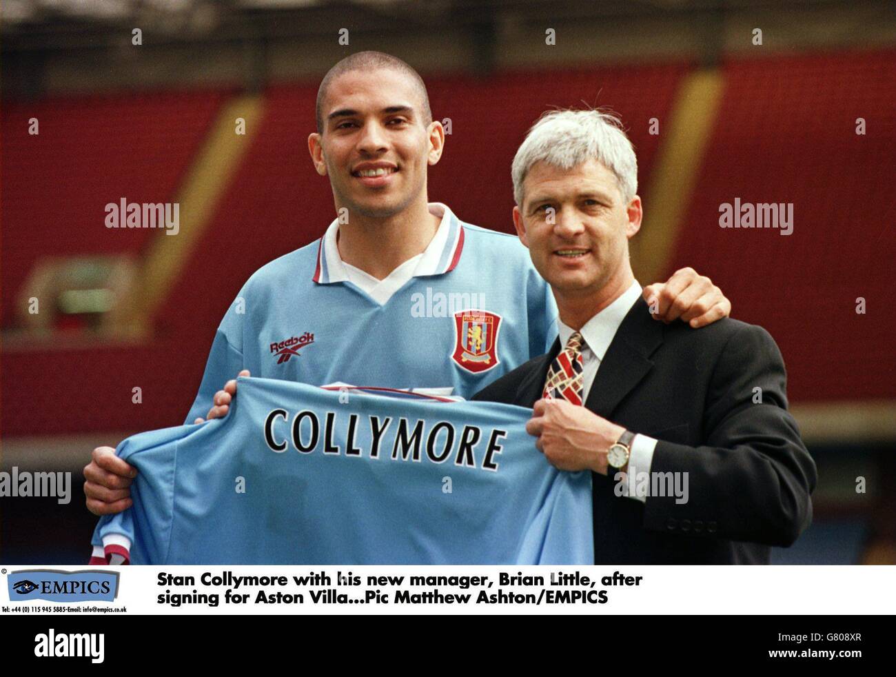 Stan Collymore with his new manager, Brian Little, after signing for ...
