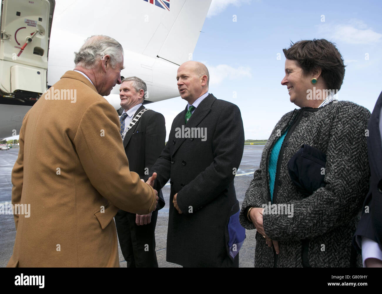 The Prince is of Wales (left) is greeted on his arrival at Shannon ...