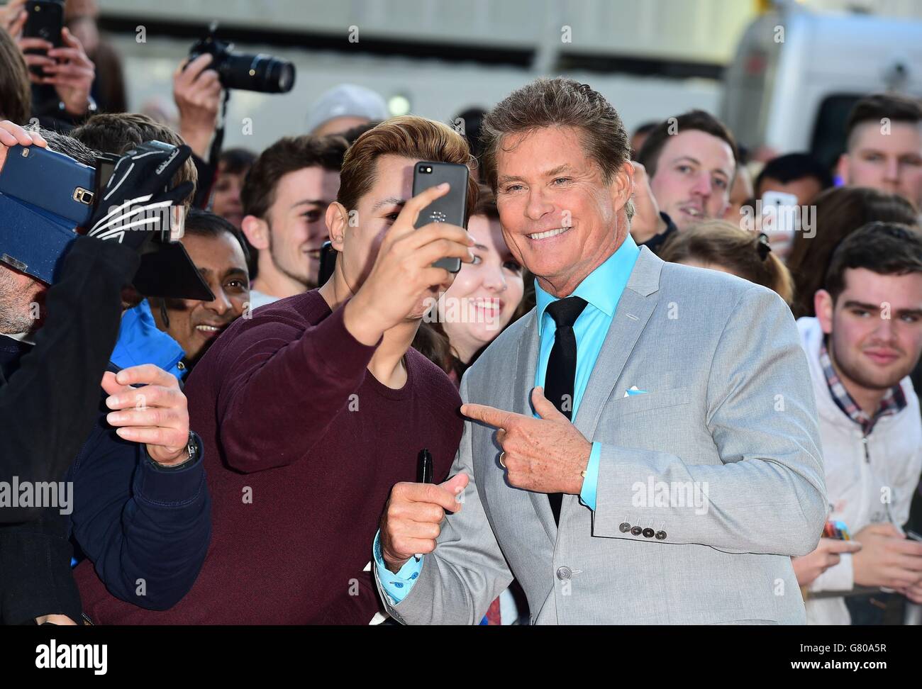 David Hasselhoff has a photo taken with a fan as he attends a press ...
