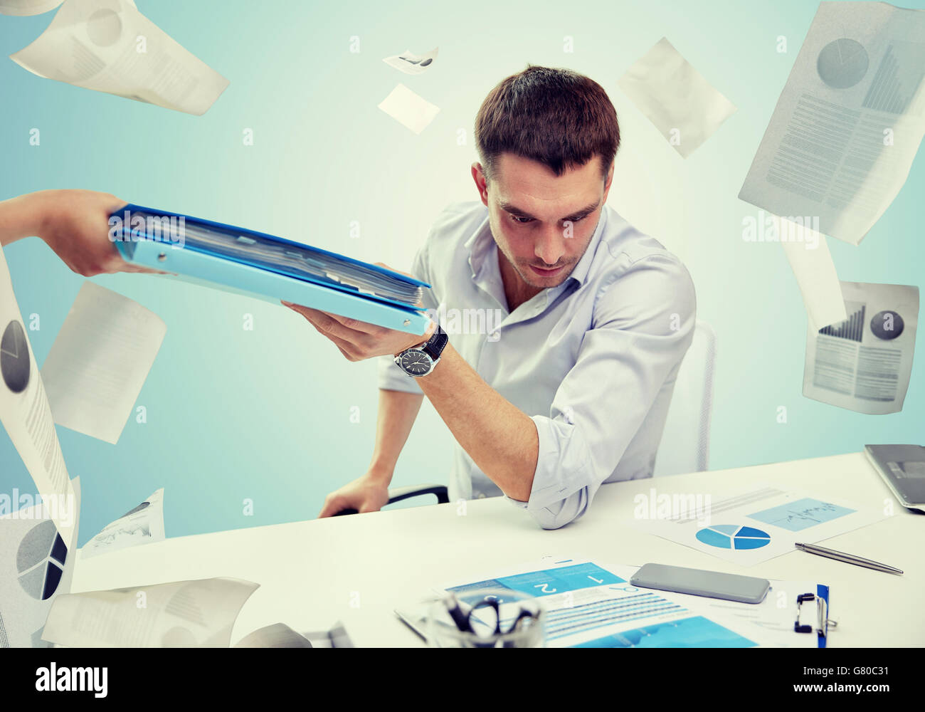 businessman taking papers from secretary Stock Photo - Alamy