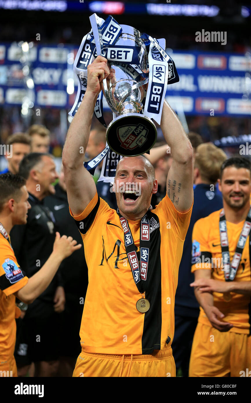 Southend United's Adam Barrett celebrates with the trophy on the ...