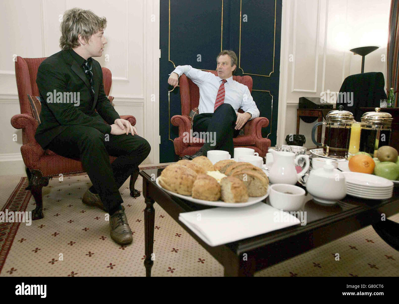 Celebrity TV chef Jamie Oliver speaks to Prime Minister Tony Blair ...