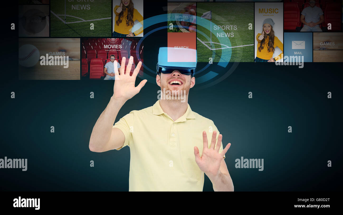 happy man in virtual reality headset or 3d glasses Stock Photo - Alamy