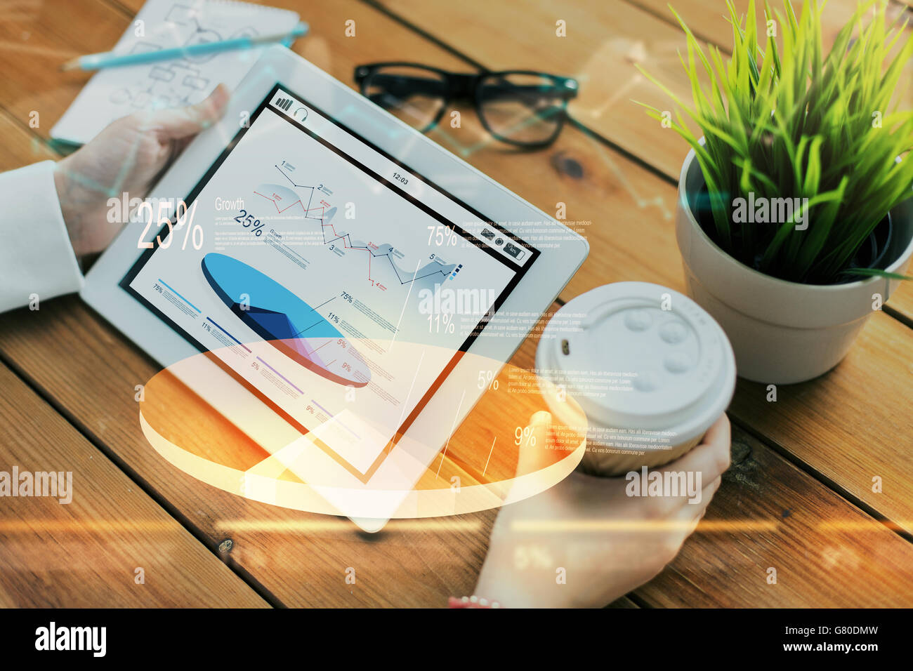 Charts and notepad on wooden table hi-res stock photography and images ...