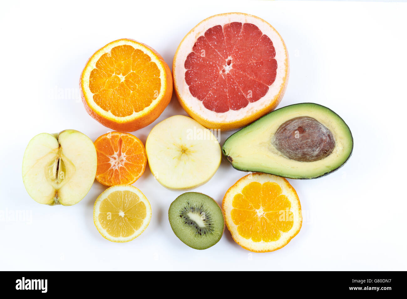 Various fruits grouped on a white background Stock Photo - Alamy