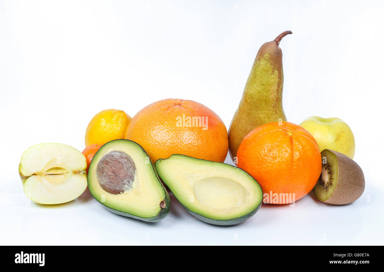 Various fruits grouped on a white background Stock Photo - Alamy