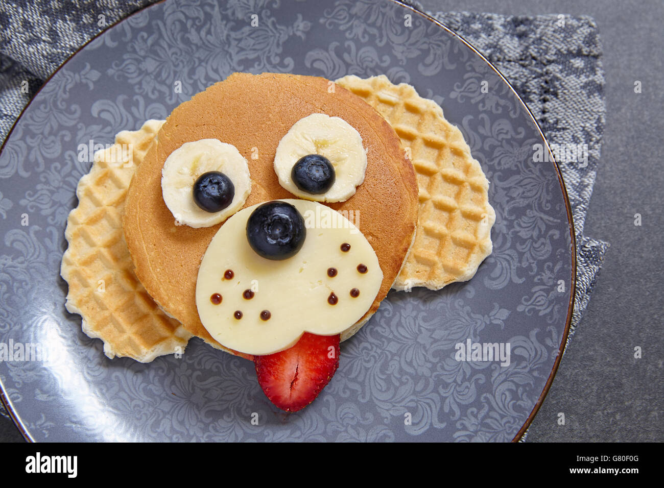 Funny pancakes for kids breakfast Stock Photo - Alamy