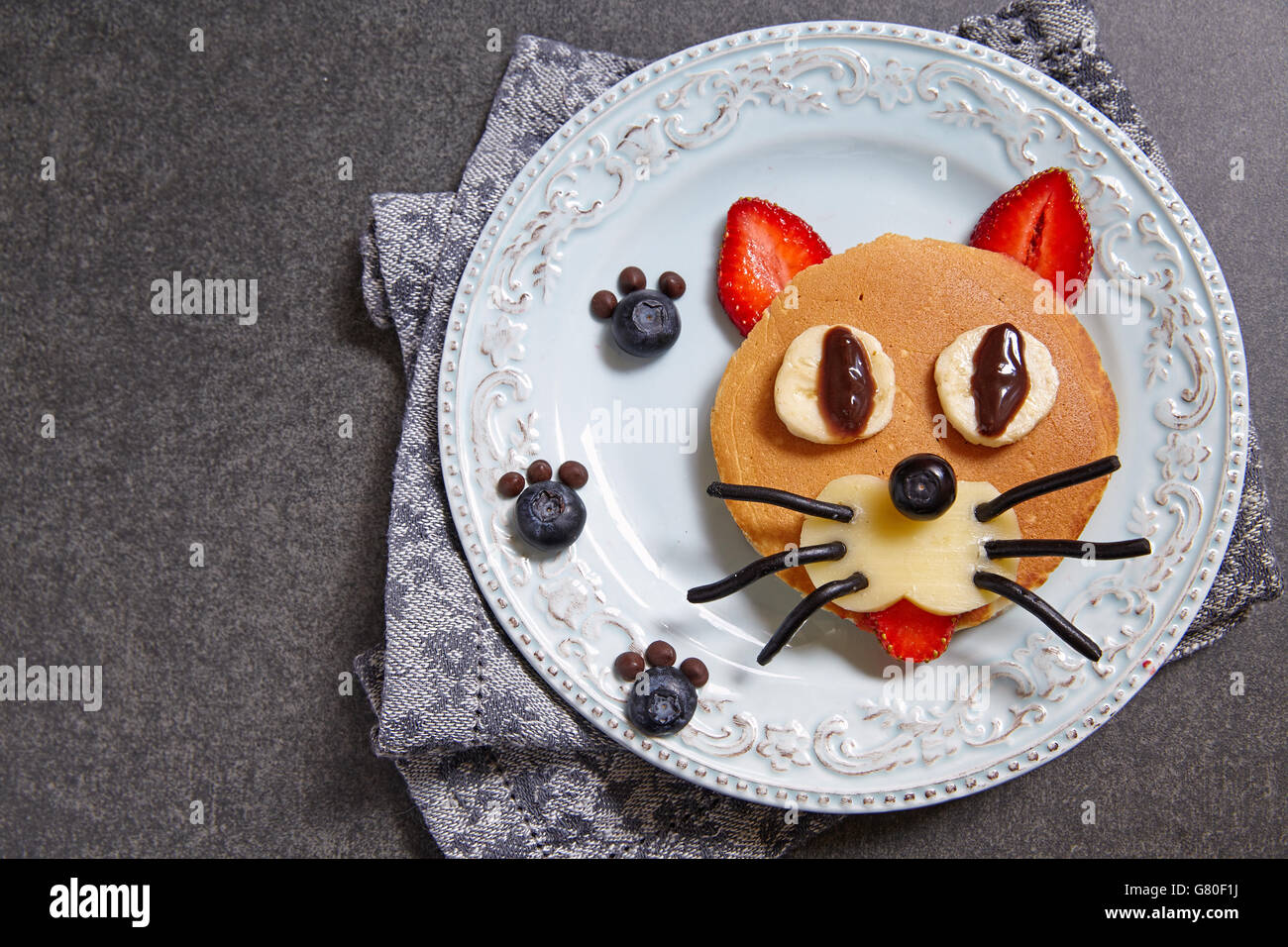 Funny pancakes for kids breakfast Stock Photo - Alamy