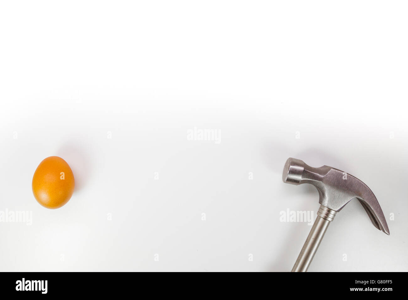 Hammer hitting egg hi-res stock photography and images - Alamy