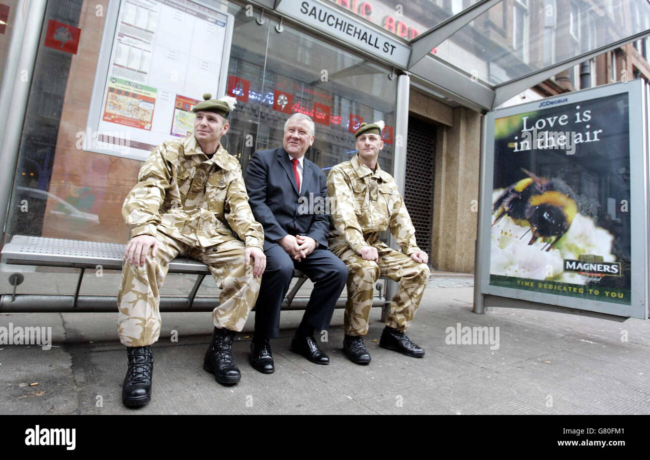 Armed forces minister Adam Ingram MP (centre) with Fusilier Stephen ...