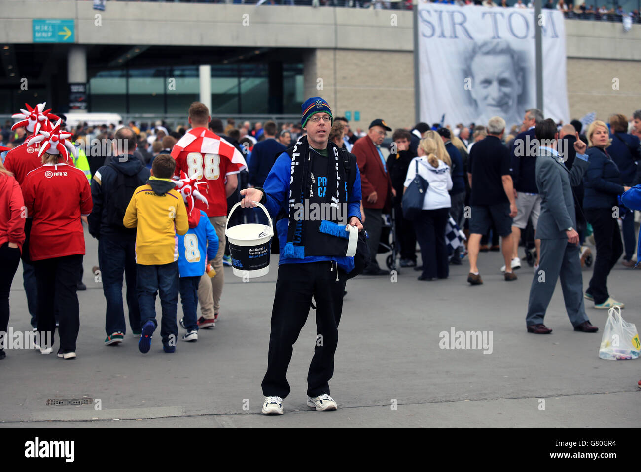 A Prostate Cancer UK volunteer collects donations on Wembley Way Stock ...