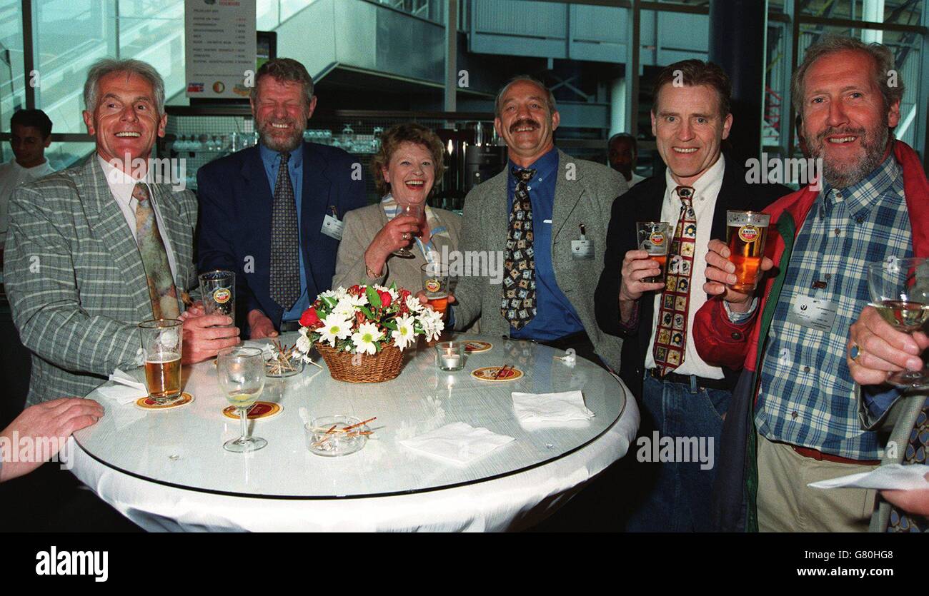 Guests enjoy the atmosphere in the hospitality area at the Feyenoord ...