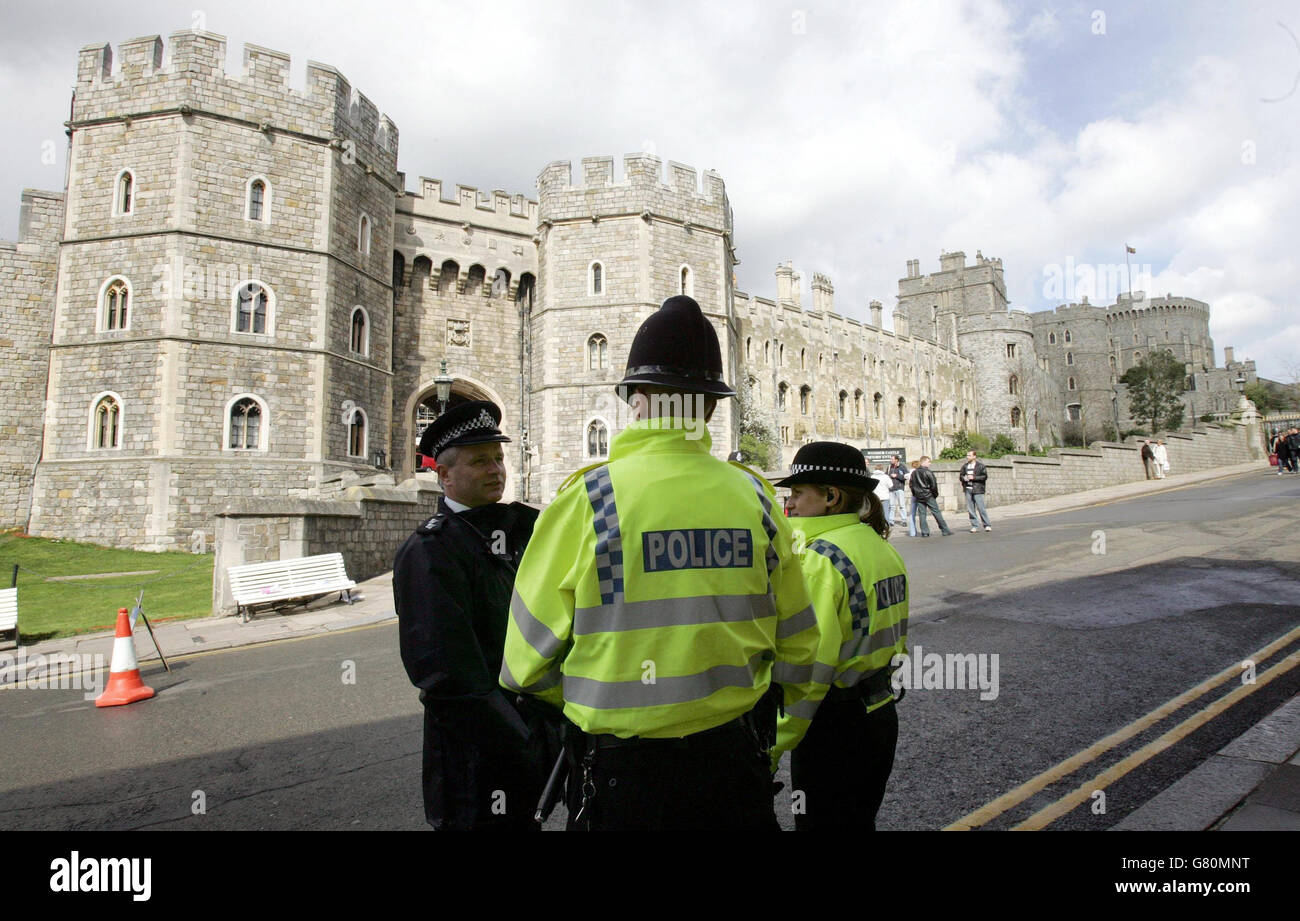 Police officers outside the gates to Windsor Castle, after a police ...