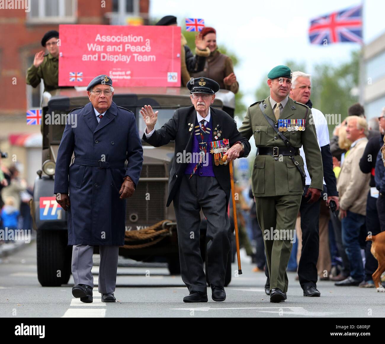 Dunkirk veteran Arthur Taylor (centre), aged 94, leads a military ...