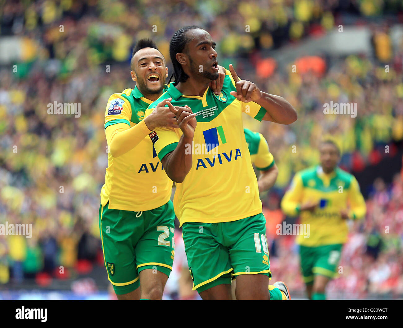 Norwich City's Cameron Jerome (right) celebrates with teammate Nathan ...