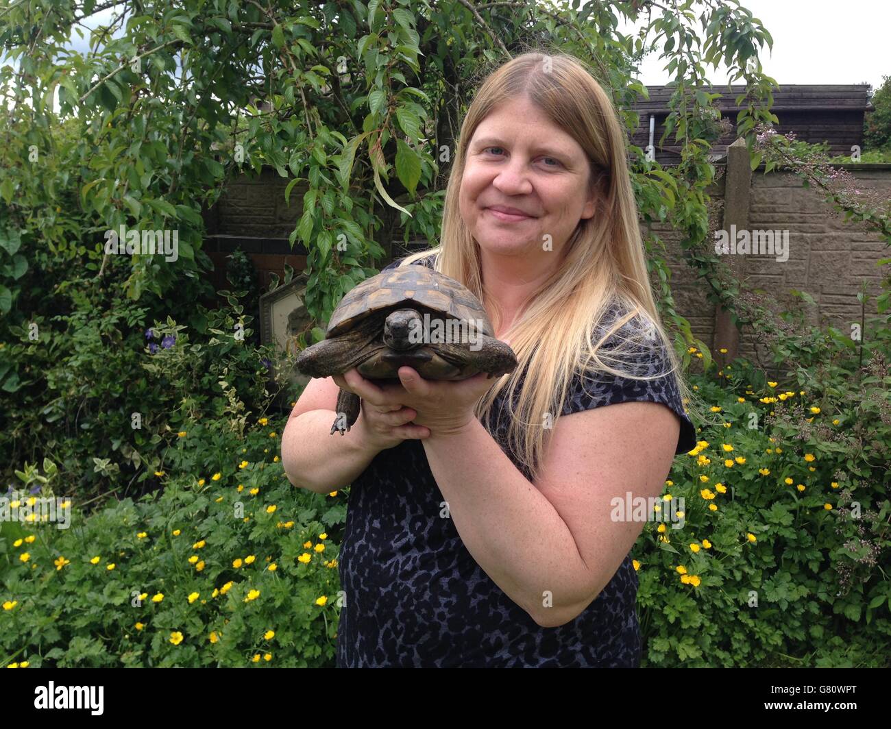 Debbie Acton, 42, of Barnacle in Warwickshire, with her tortoise Bobby ...