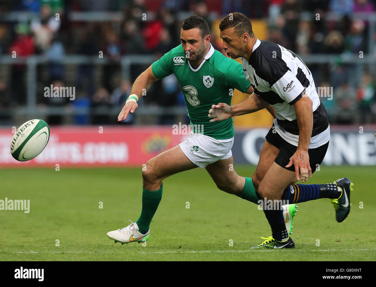 Ireland's Dave Kearney (left) and Barbarians' Zane Kirchner during the ...