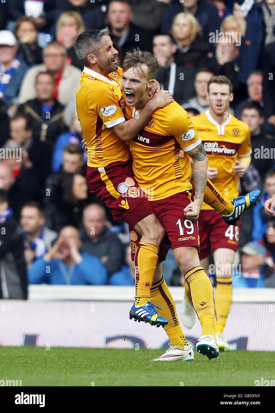Motherwell's Lee Erwin celebrates his goalwith teammate Keith Lasley ...