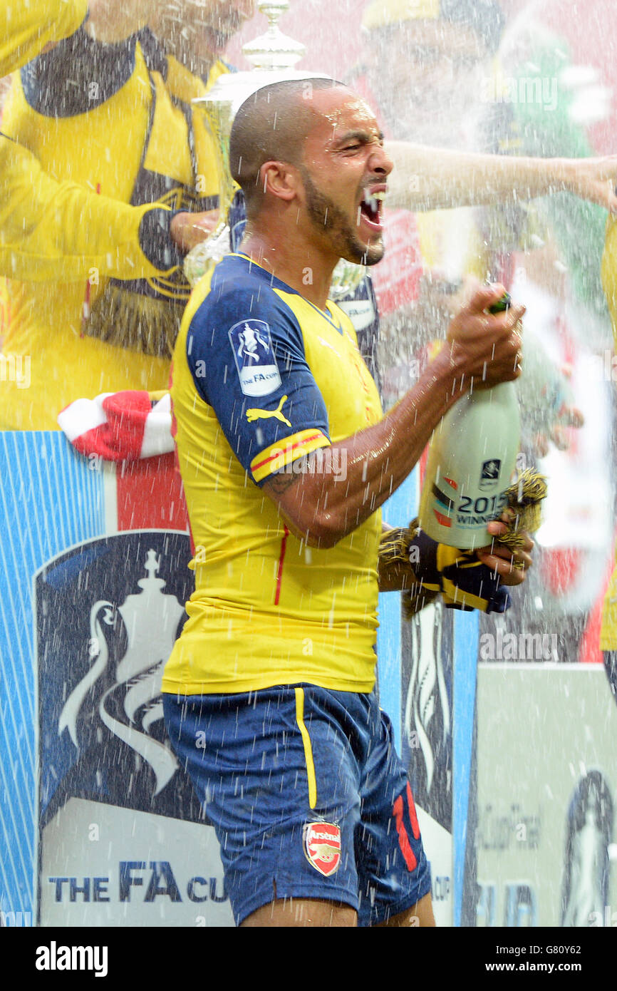 Arsenal's Theo Walcott celebrates victory at the end of the FA Cup ...