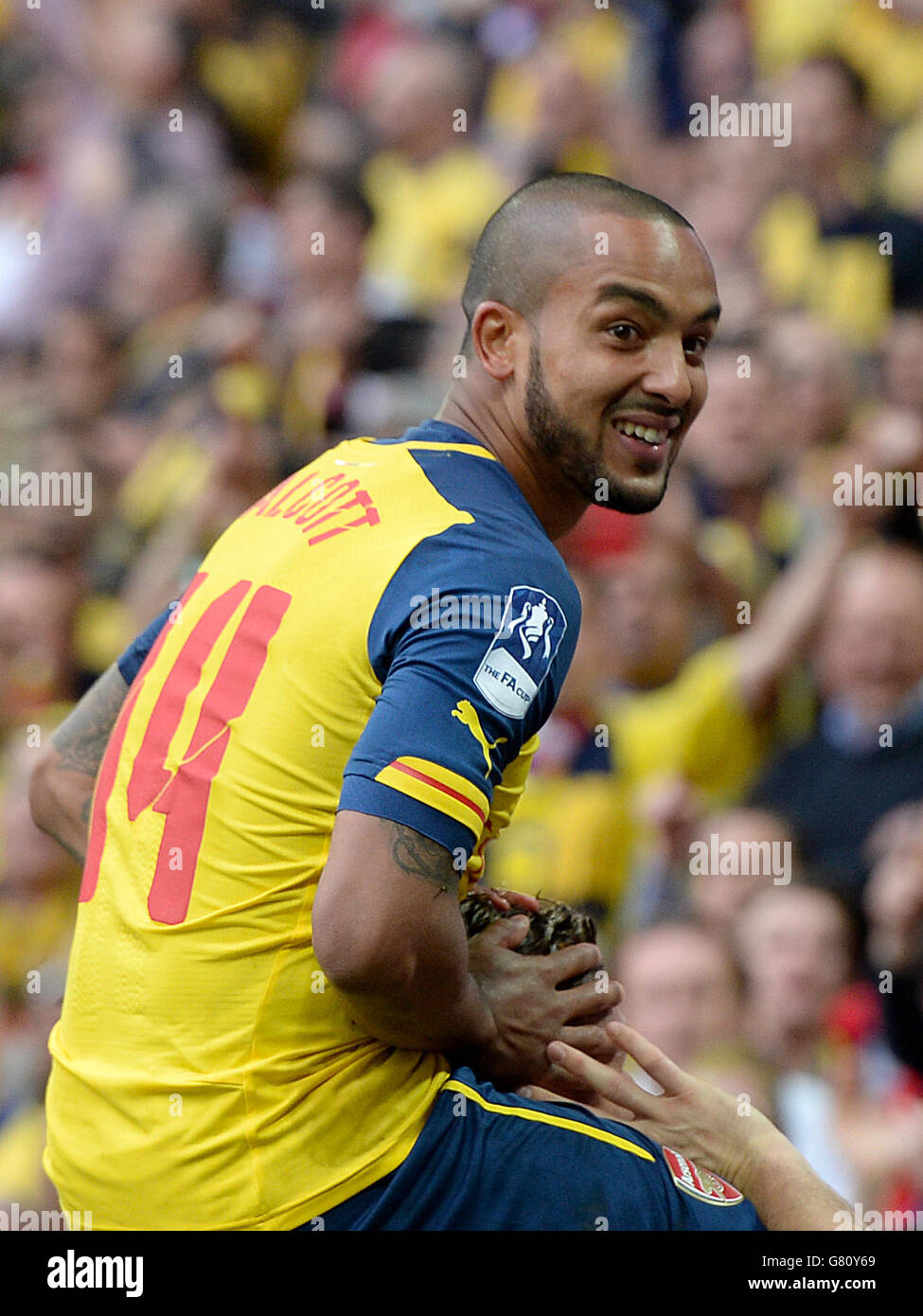 Arsenal's Theo Walcott celebrates victory at the end of the FA Cup ...