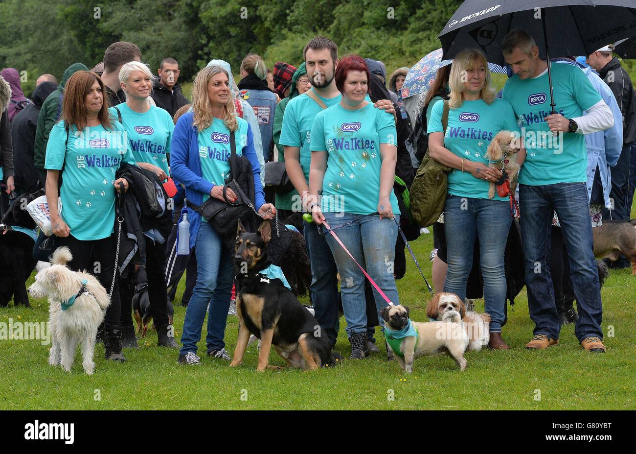 Dogs and their owners take part in a sponsored RSPCA 5k dog walk at ...