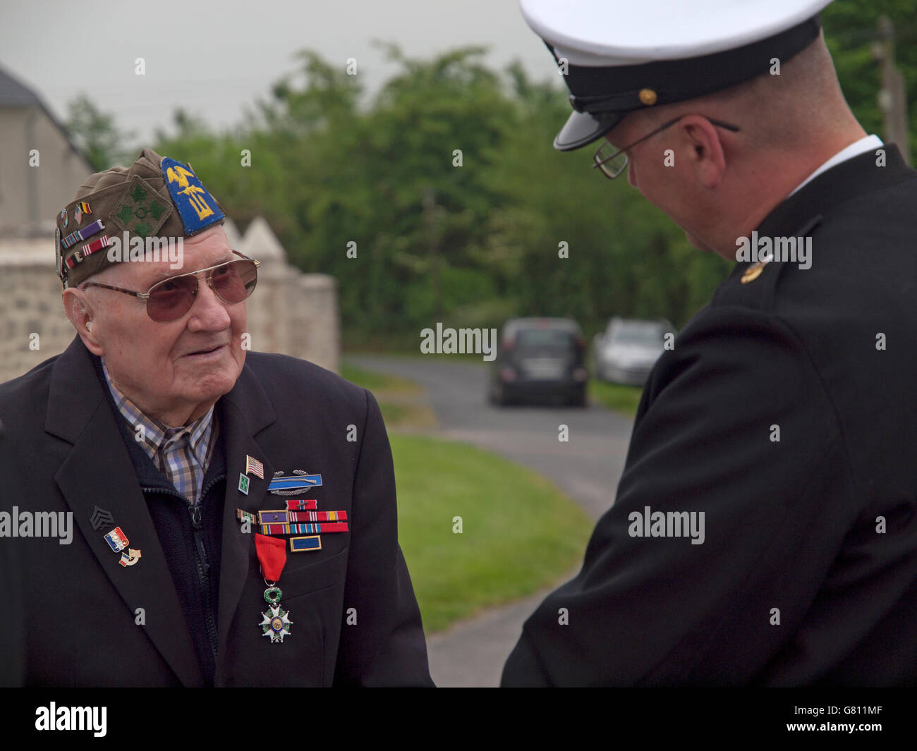 A gathering of veterans, serving soldiers and local dignitaries in ...