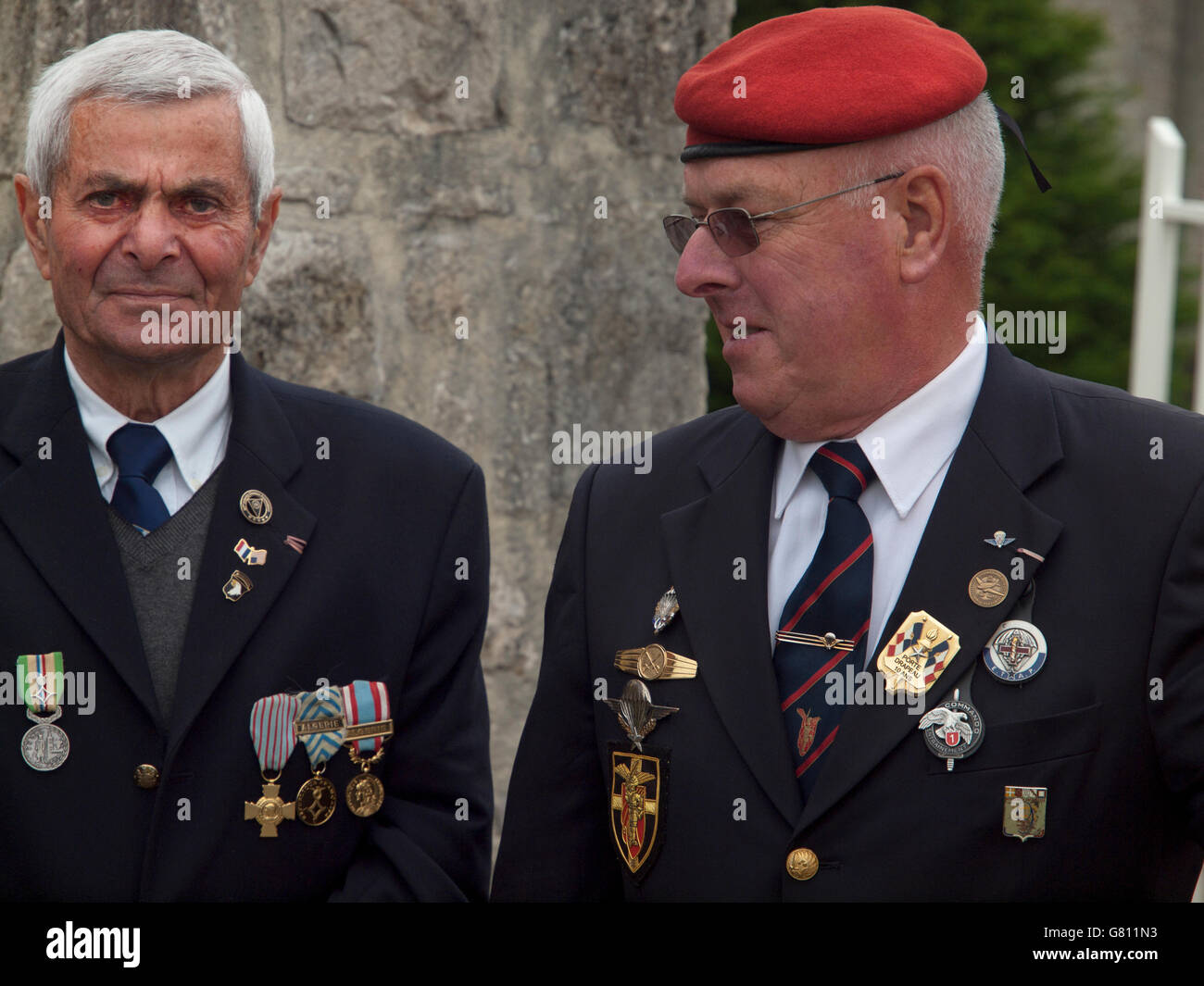 A gathering of veterans, serving soldiers and local dignitaries in ...