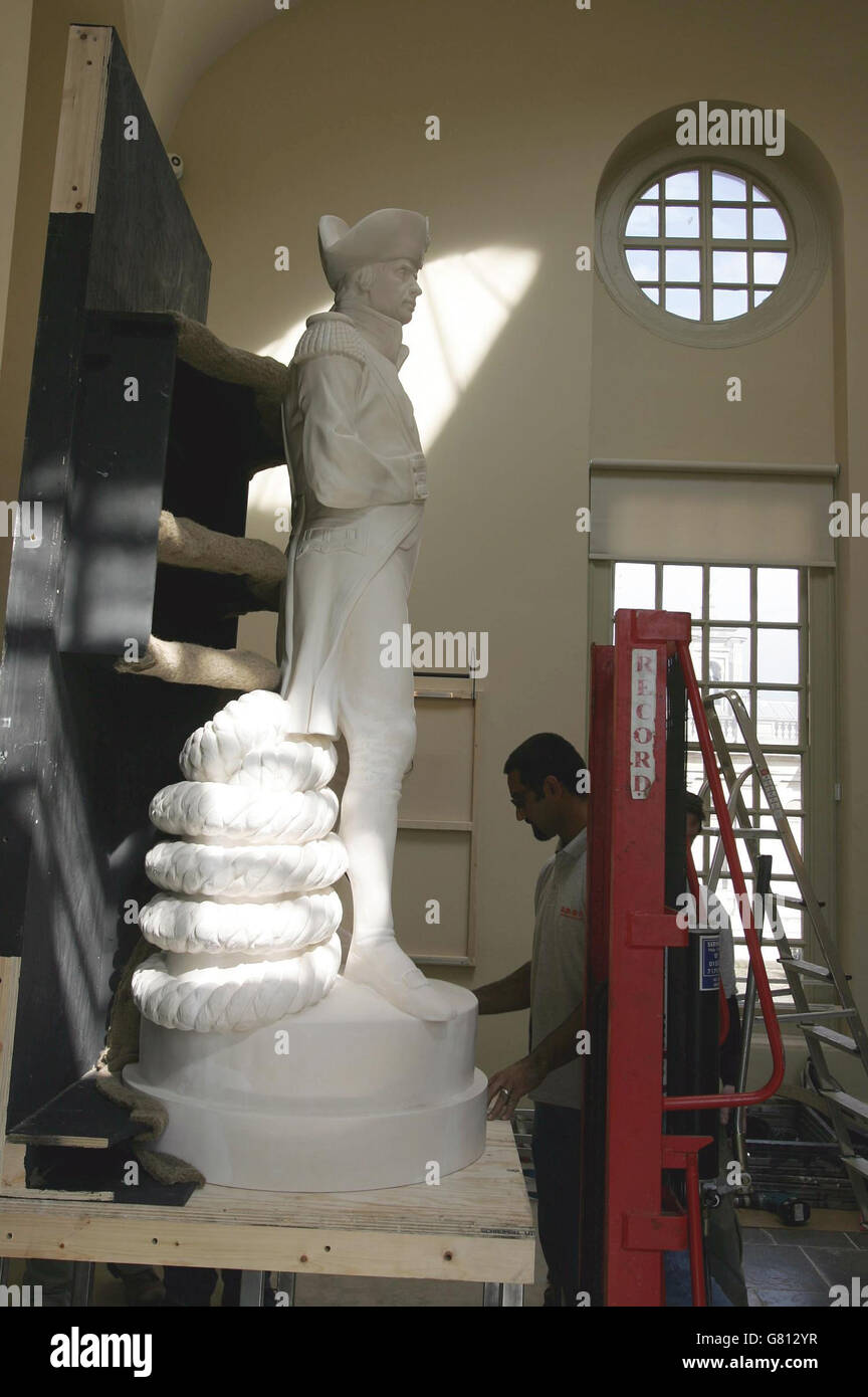 A newly commissioned life size statue of Nelson is lifted on a ...