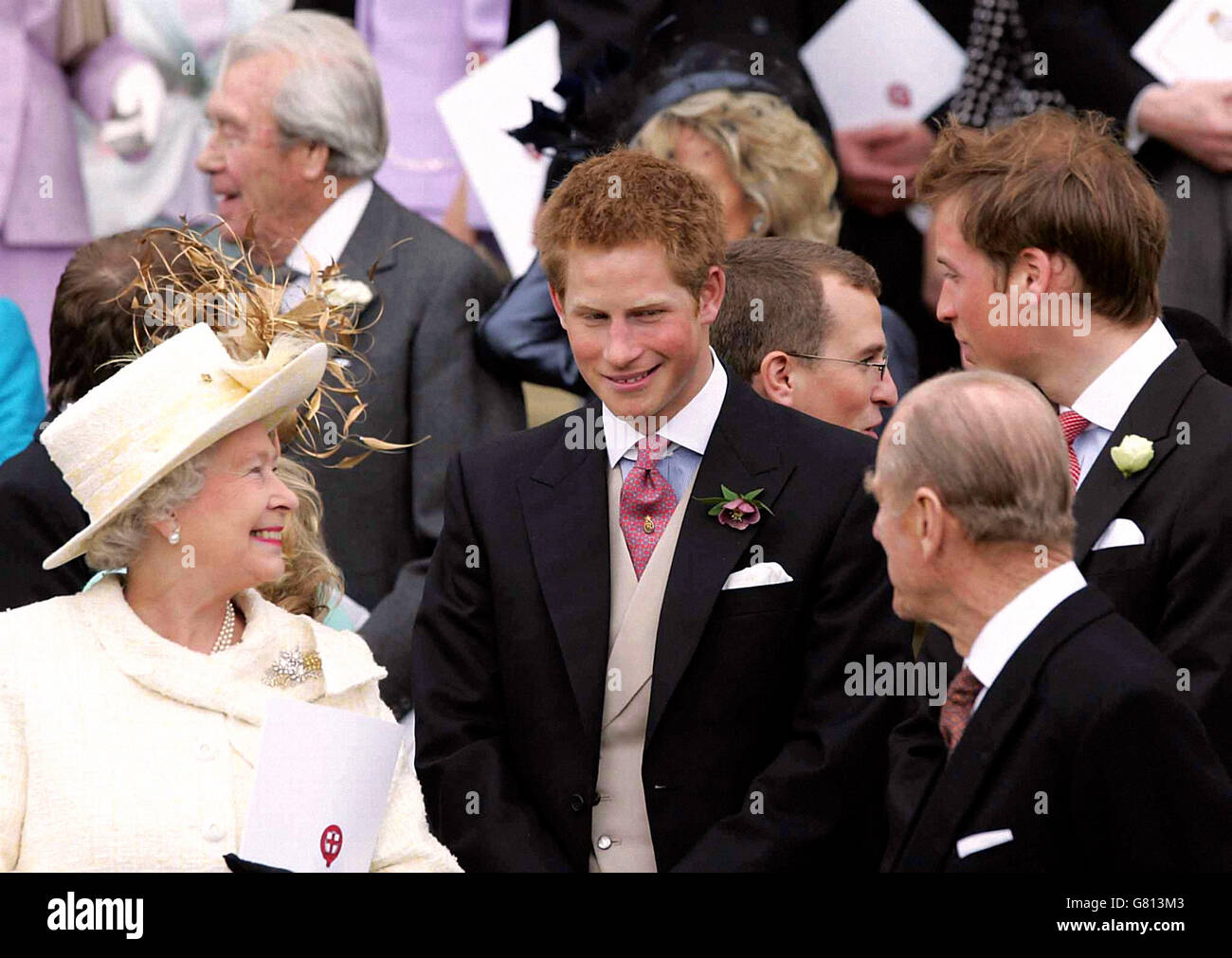 Britain's Prince Harry (centre) stands between Britain's Queen ...