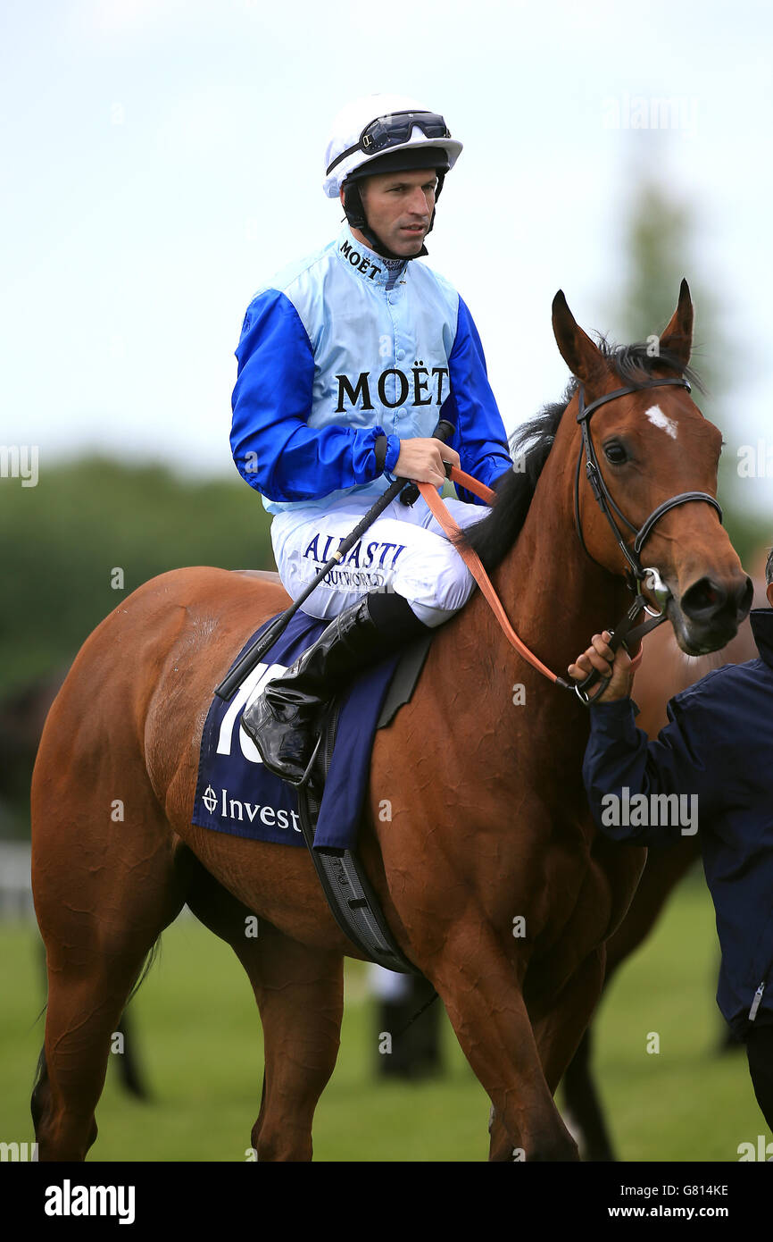 Jockey Pat Dobbs on Miss Moneypenny after the Investec Woodcote Stakes ...